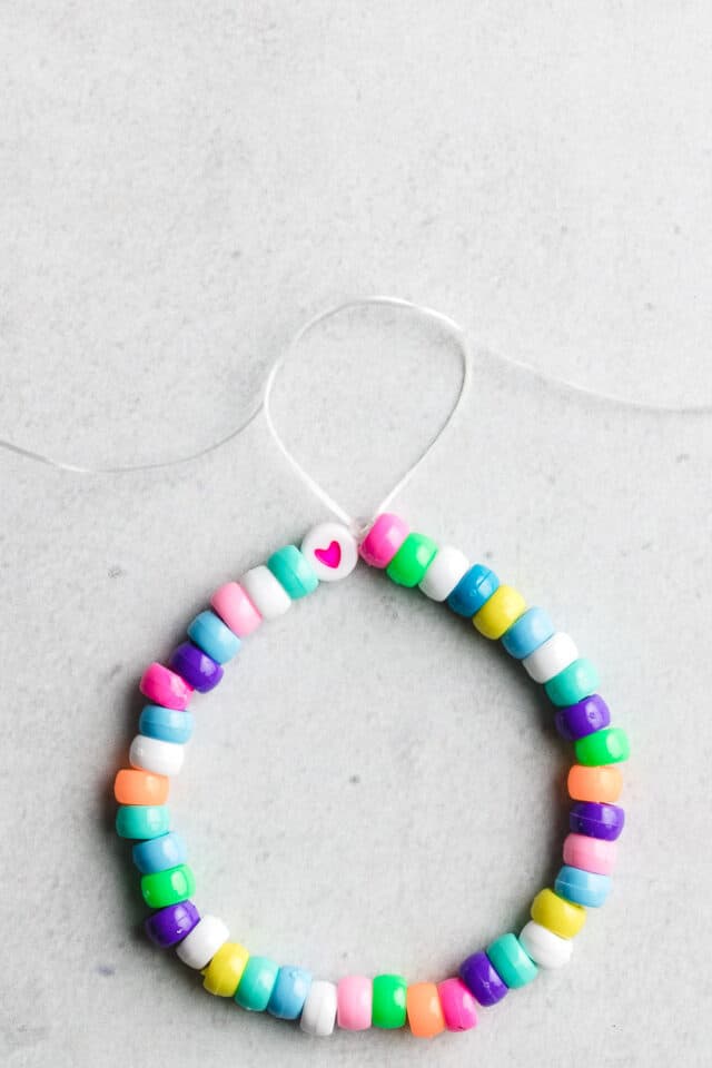 How to Make Stretchy Beaded Bracelets with Elastic Cord - Sarah Maker