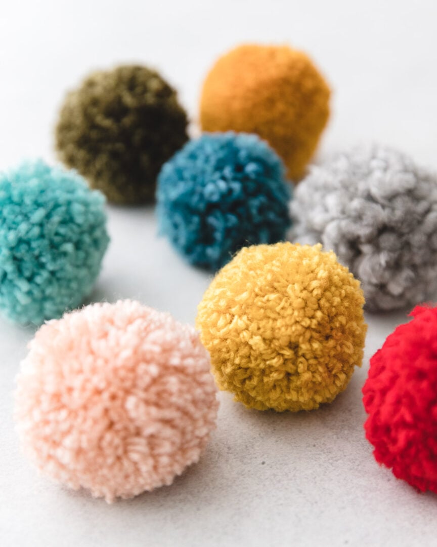 How to Make a Yarn Pom Pom with a Free Cardboard Template - Sarah Maker