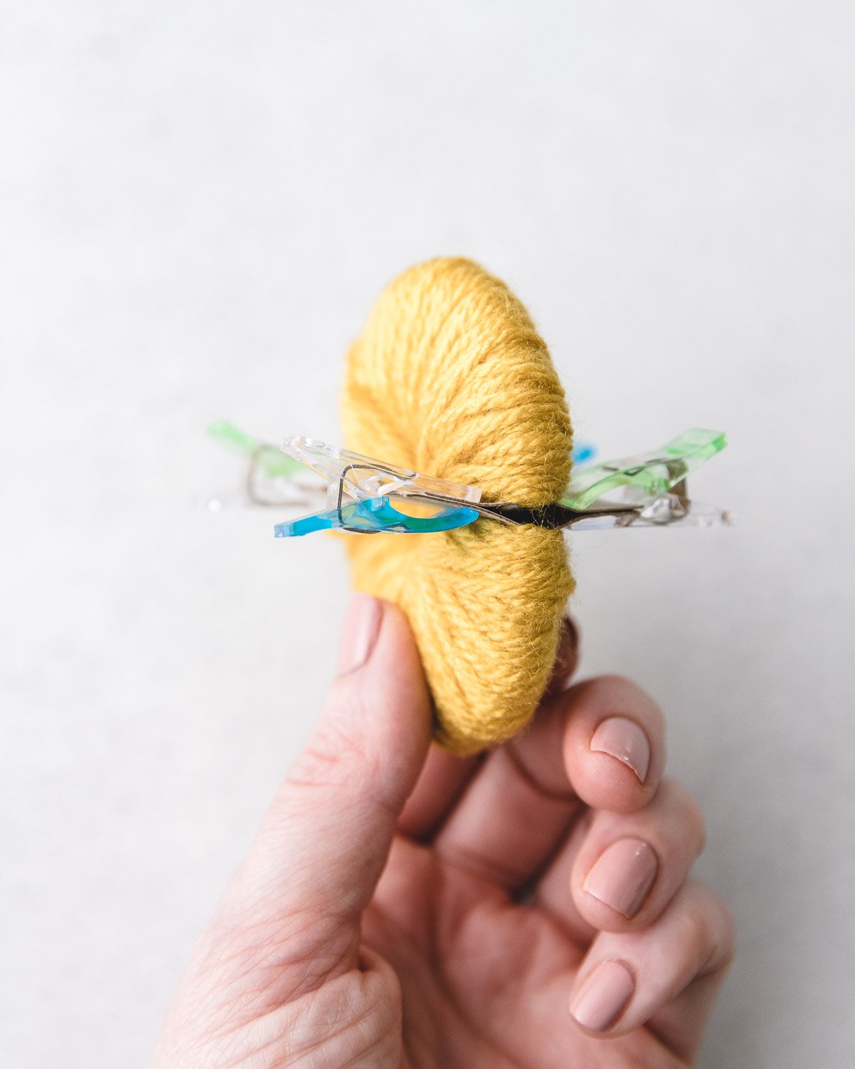 How to Make a Yarn Pom Pom with a Free Cardboard Template - Sarah Maker